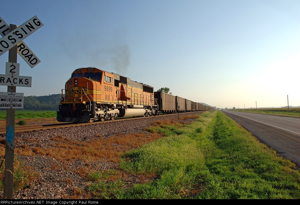 BNSF 9899, EMD SD70MAC, brings up the rear as a DPU remote on a southbound coal train